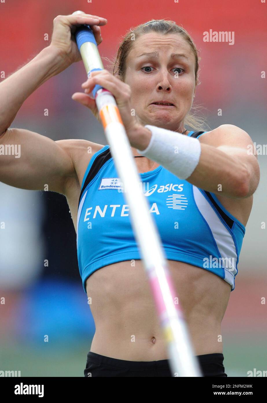 Carolin Hingst runs for a attempt at the women pole vault competition ...