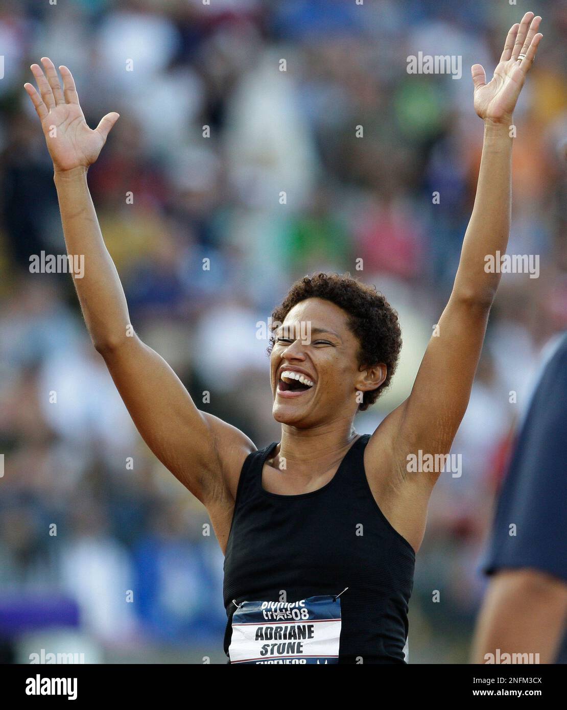 Adriane Stone reacts after beating her personal best during the women's ...