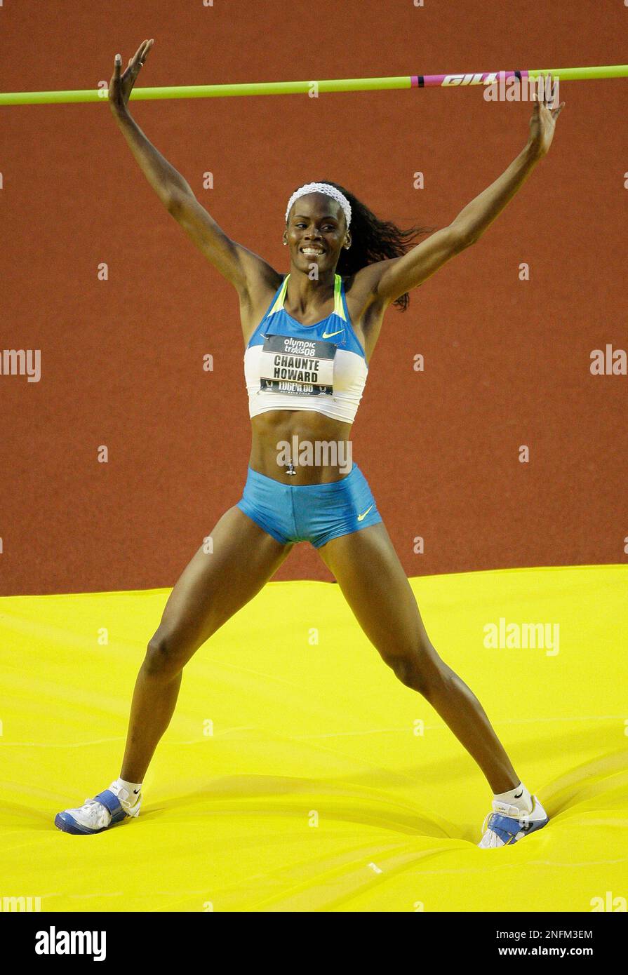 Chaunte Howard reacts after clearing the bar in the women's high jump ...