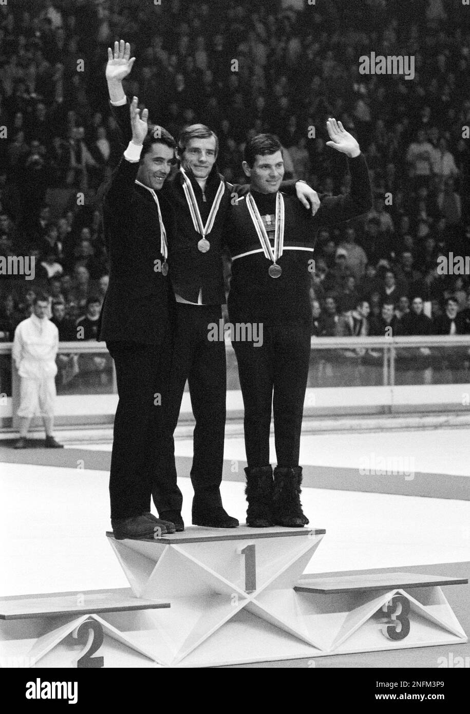 On the podium after receiving their medals for taking the first three ...