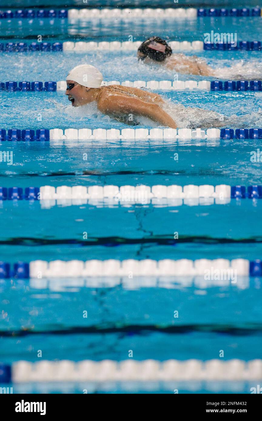 Elaine Breeden, left, and Kathleen Hersey swim in the women's 200-meter ...