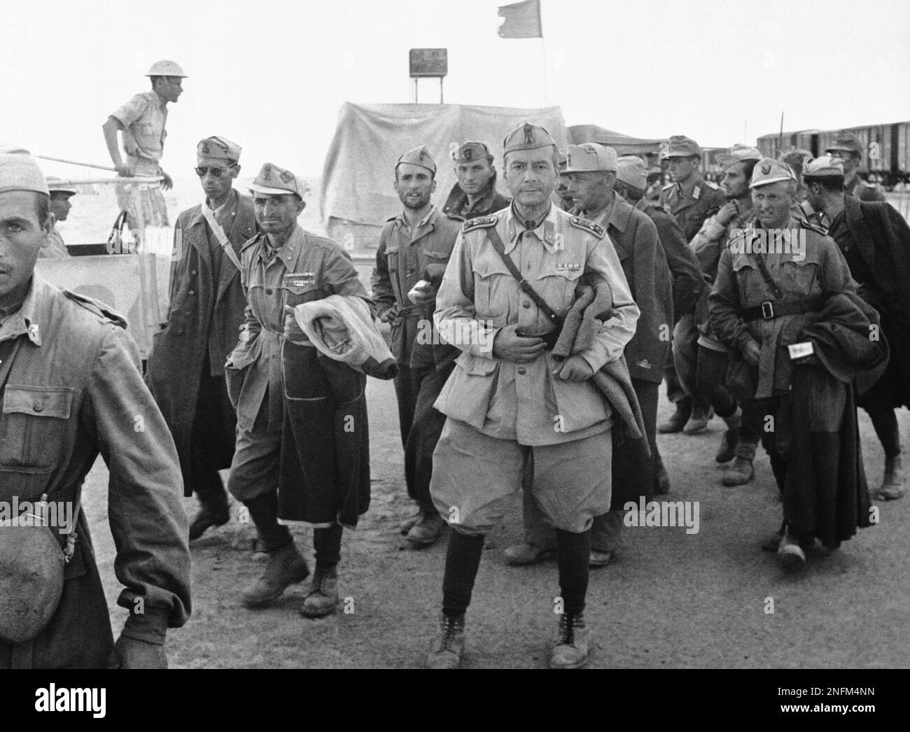 Italian staff officers walking to Alamein station on Dec. 8, 1942, to ...