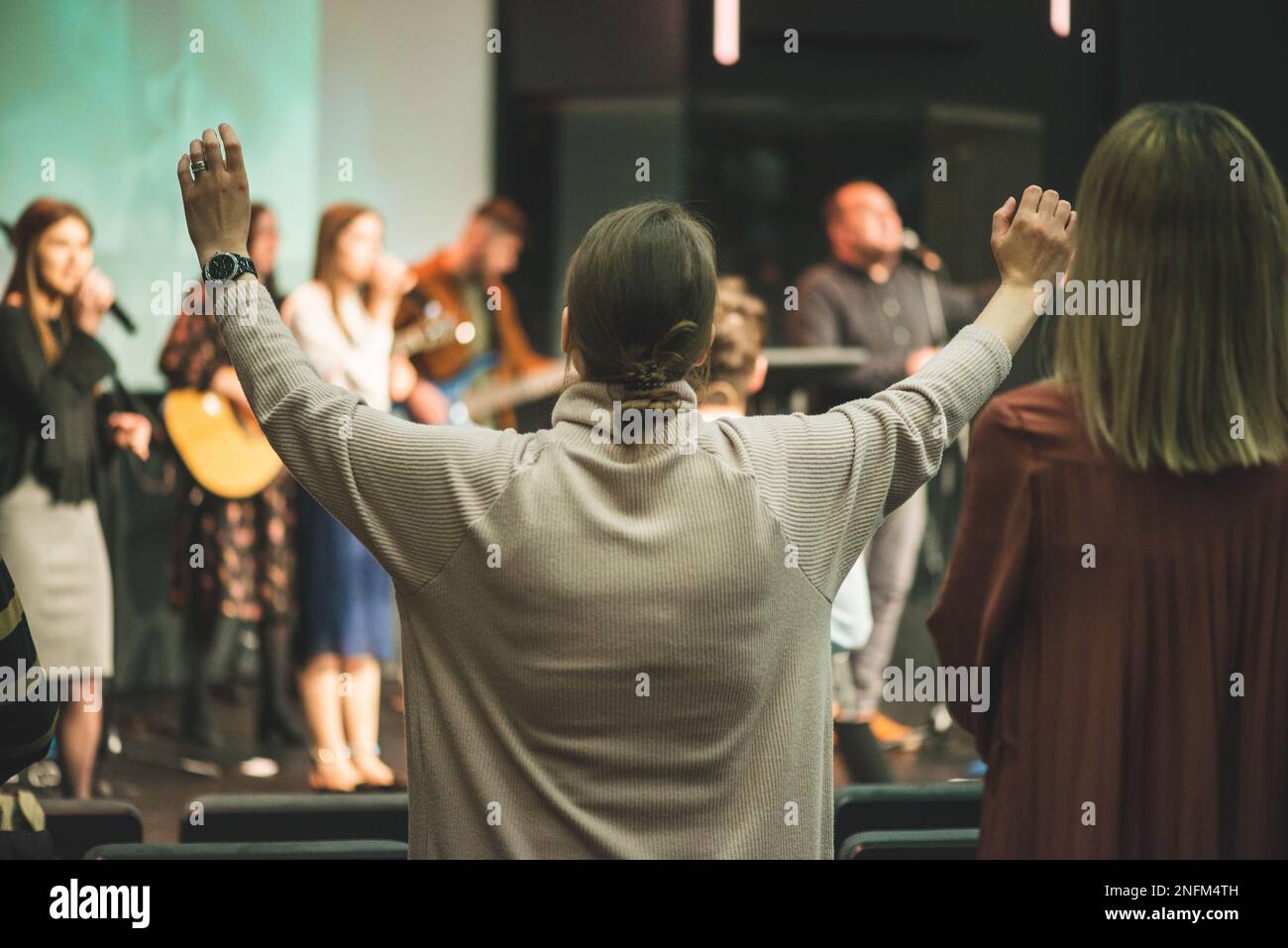 Hand raised in praise hi-res stock photography and images - Alamy