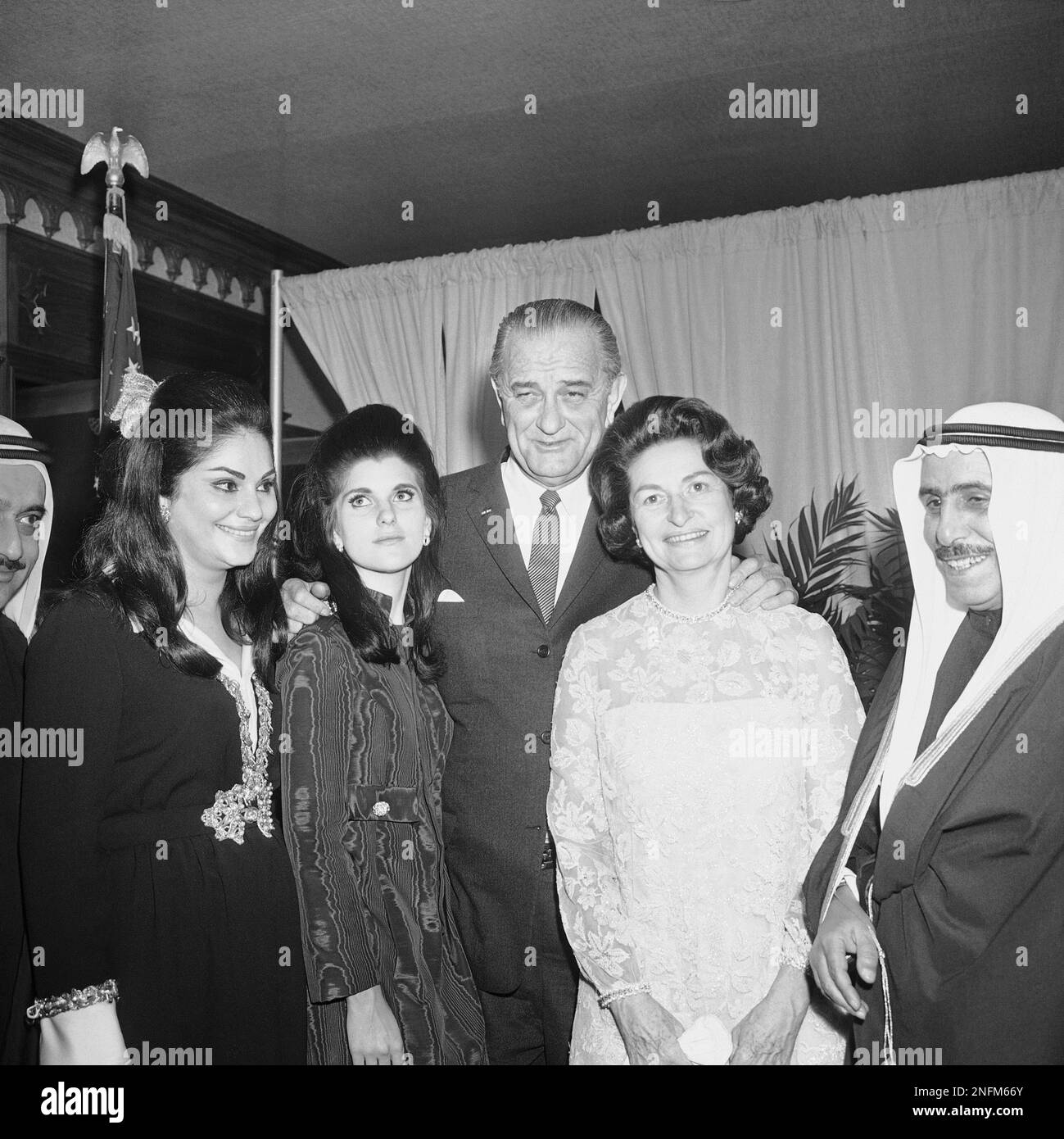 Amir Shaikh Sabah greets President Lyndon Johnson, who stands with his ...