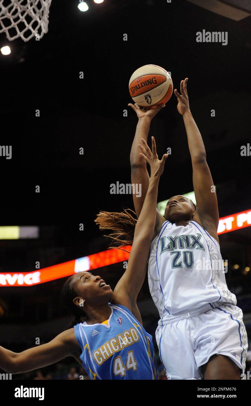 Minnesota Lynx's Charde Houston (20) shoots against Chicago Sky's ...