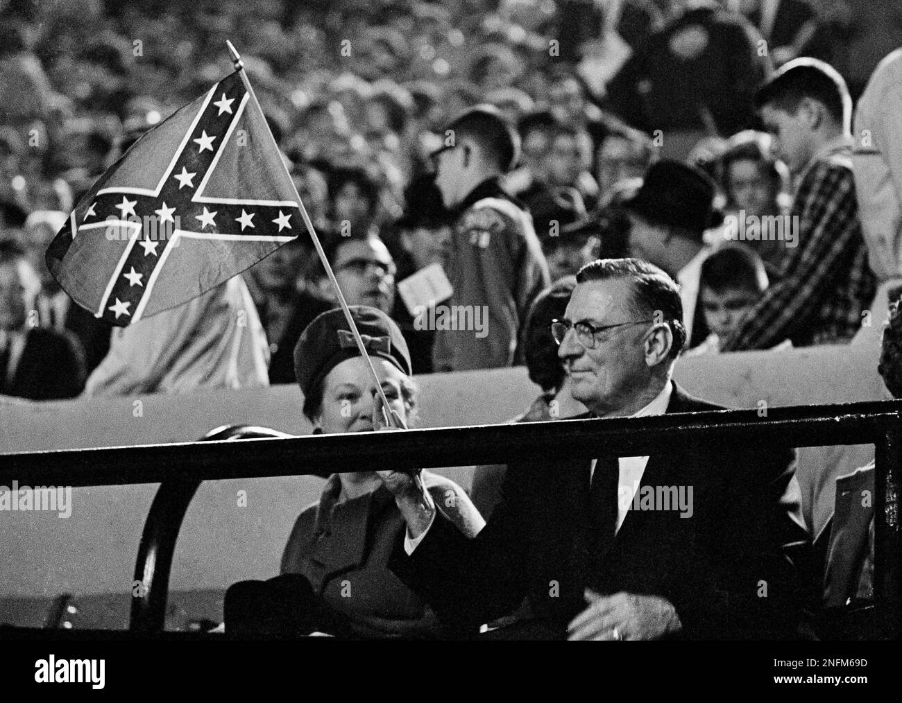 Mississippi Gov. Ross Barnett waves a confederate flag before the start ...