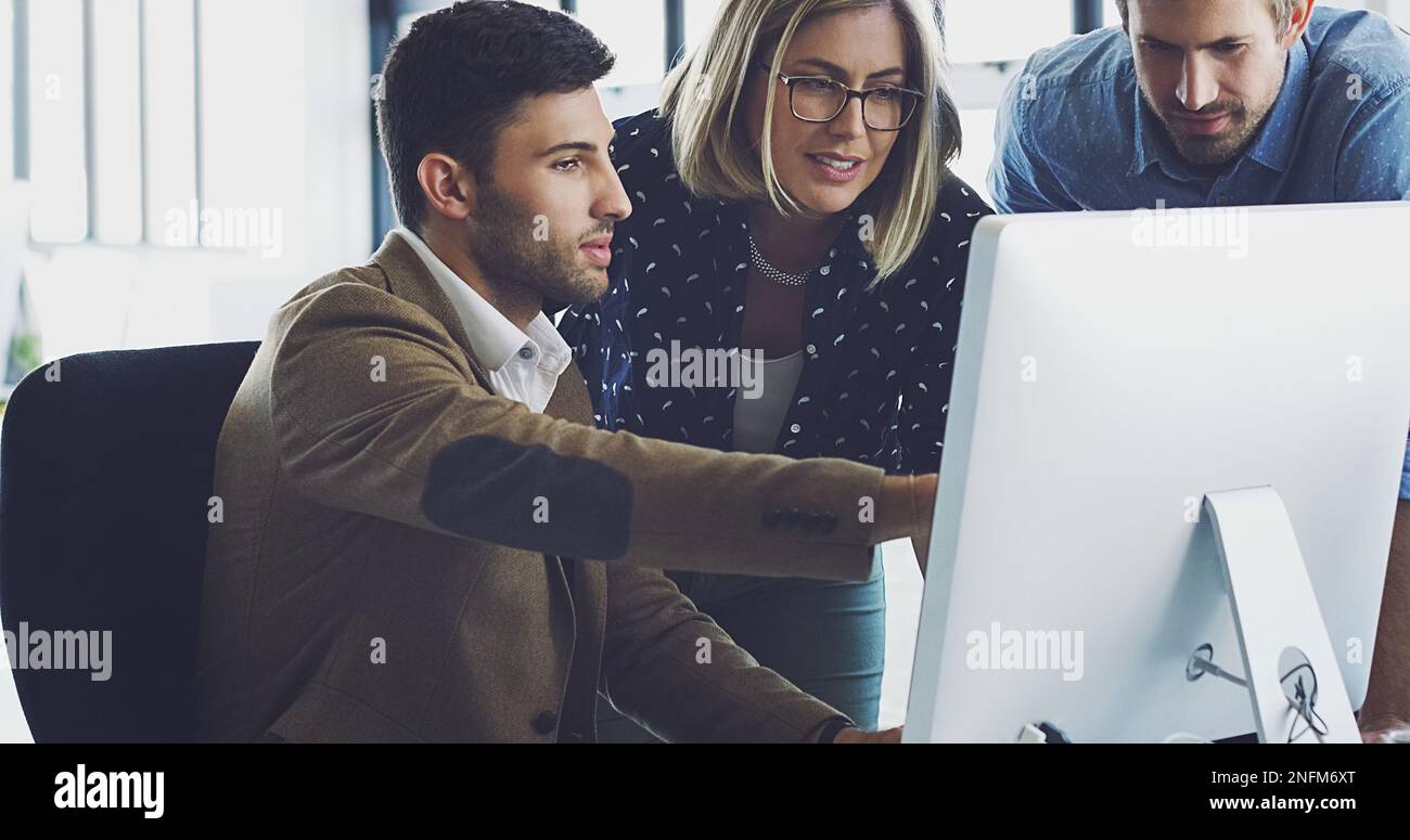 Teamwork, coaching and review with business people at computer for ...