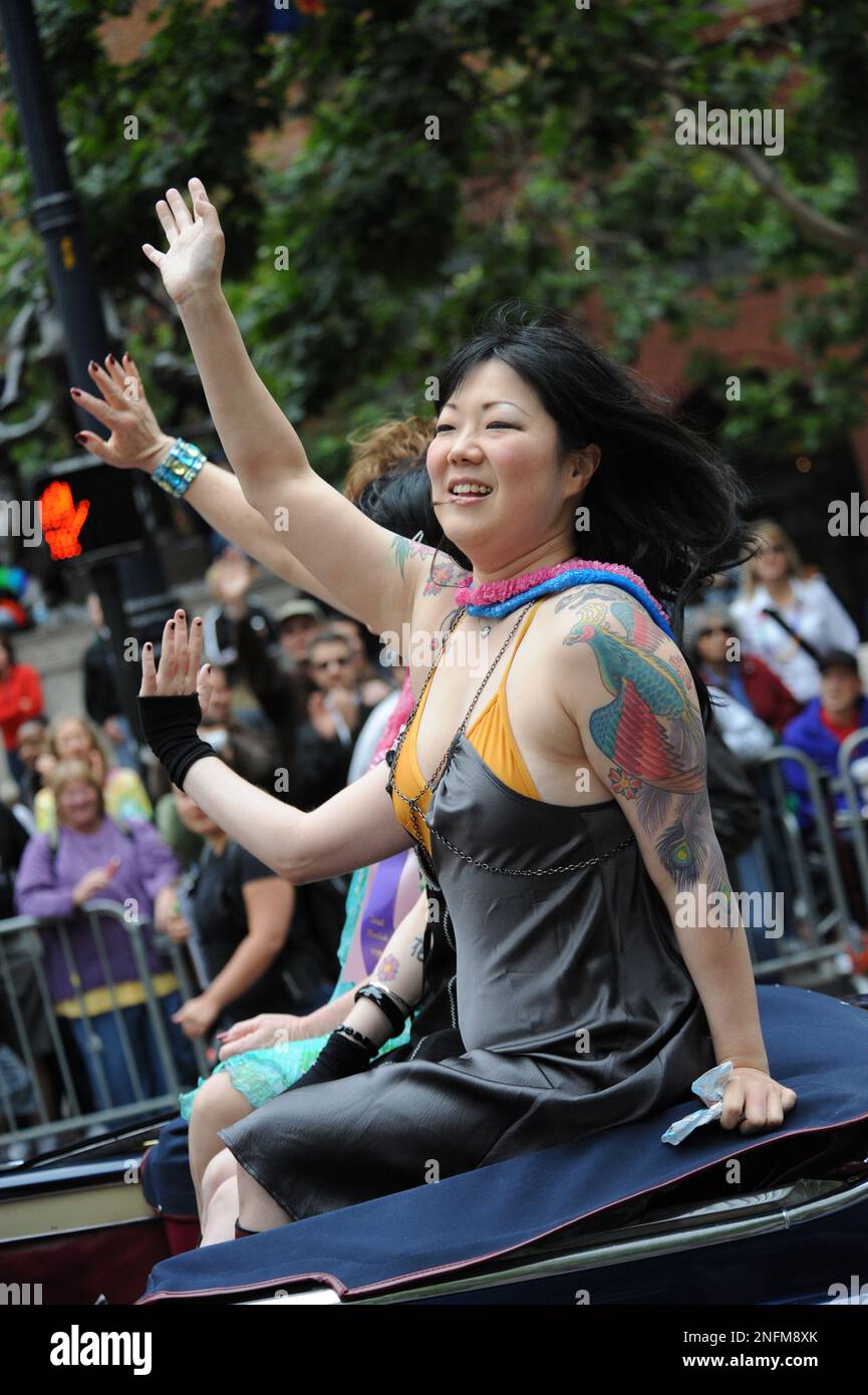 Margaret Cho rides in a car at the Gay Pride Parade in San Francisco ...