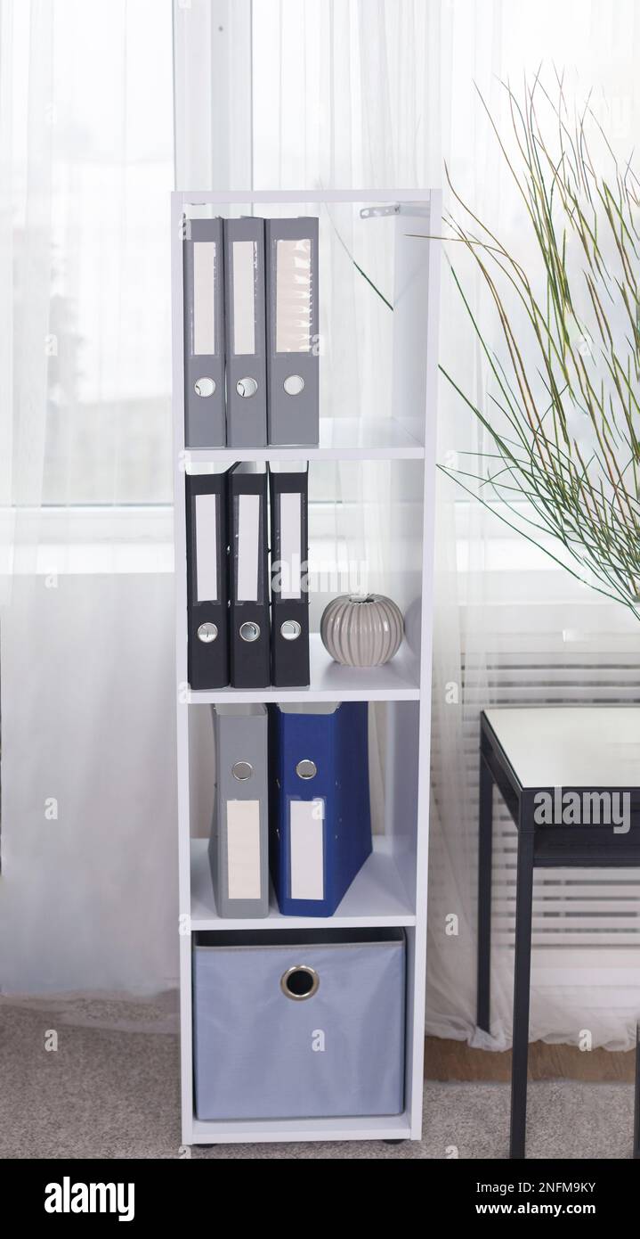 large bright office. shelves with folders Stock Photo - Alamy
