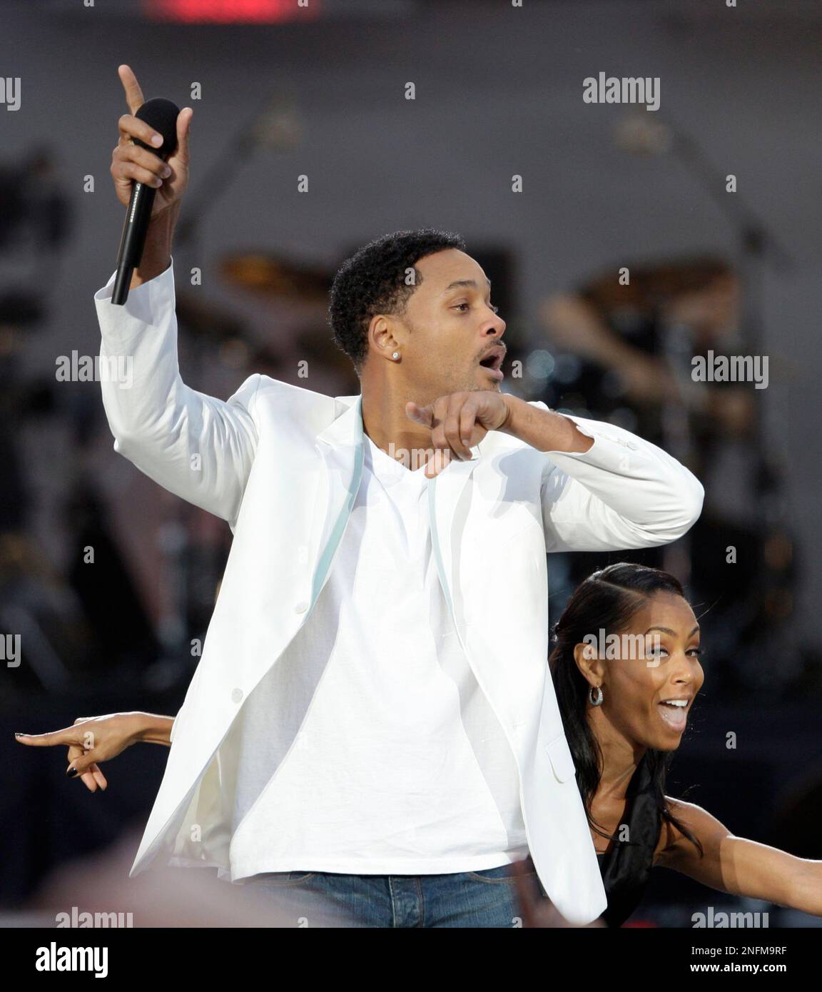 U.S. actor Will Smith, left, performs with his wife U.S. actress Jada ...