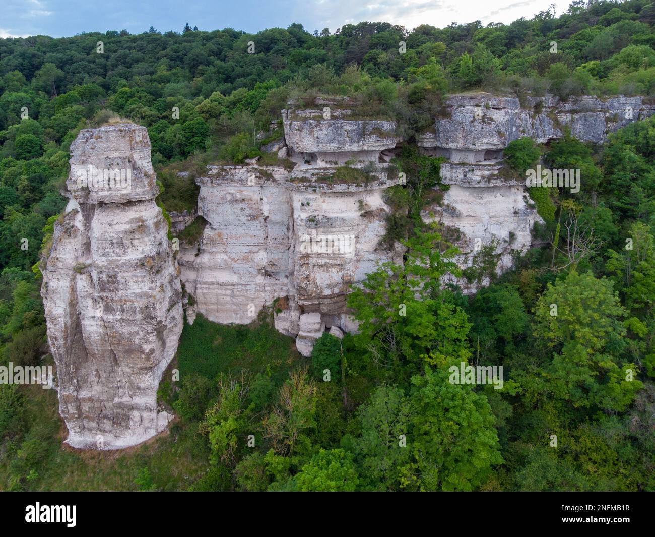The large rocky cliffs between the green woods Stock Photo - Alamy