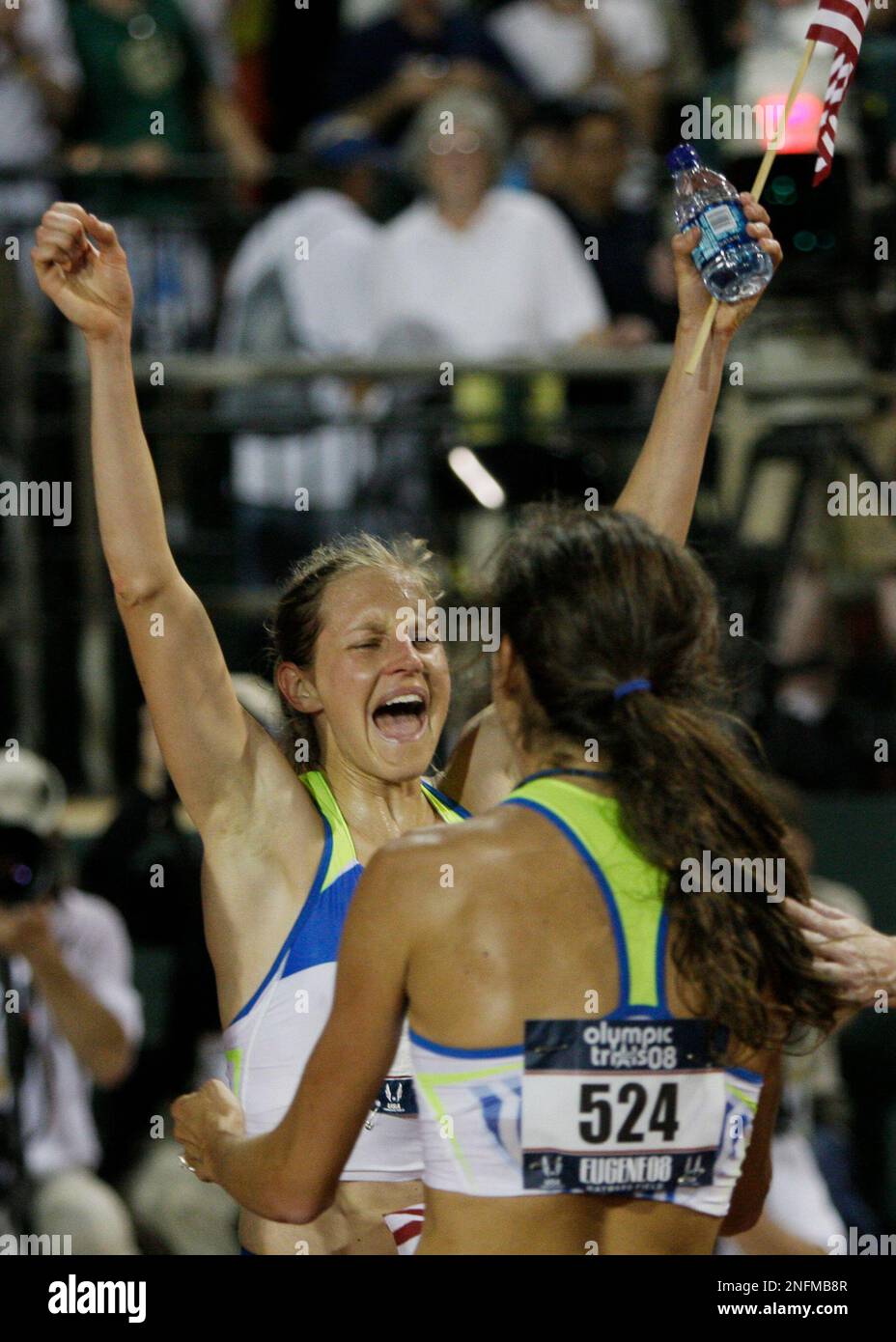 Amy Begley , left,Kara Goucher celebrate after their respective second ...