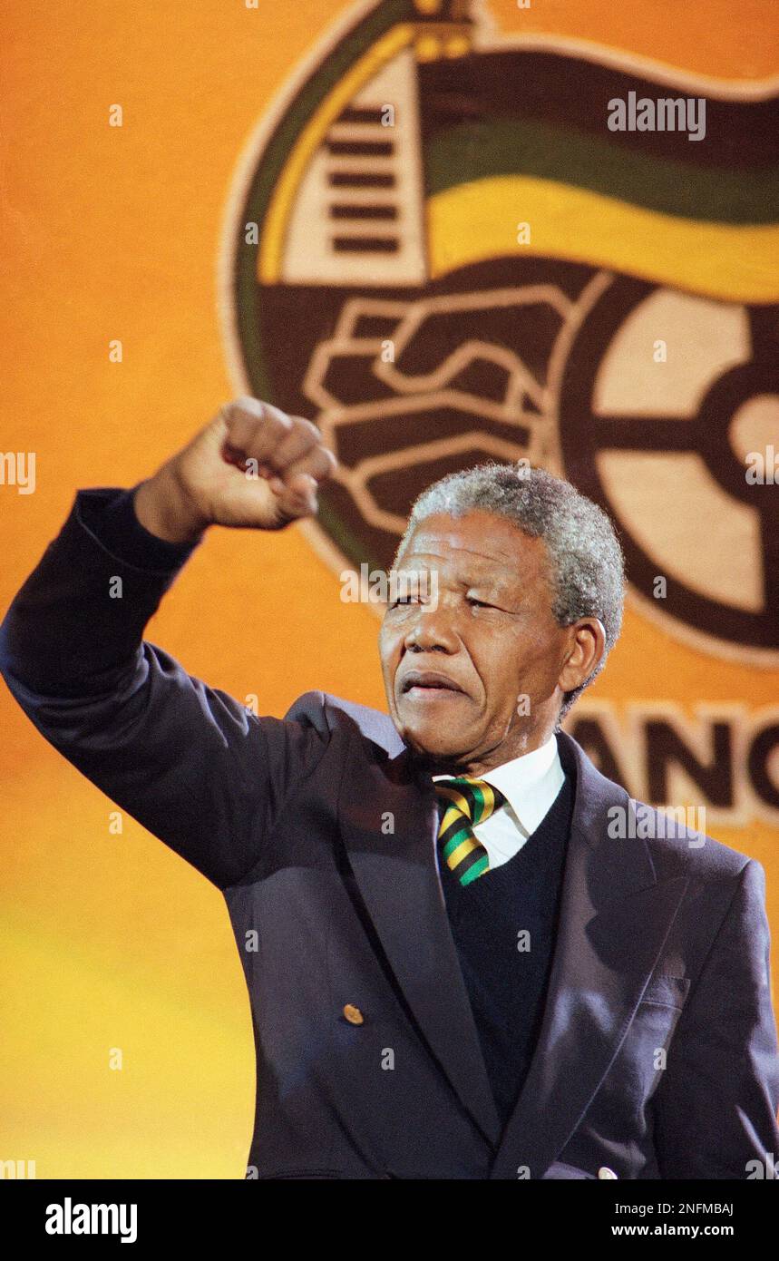 South African Black Nationalist leader Nelson Mandela raises his fist ...