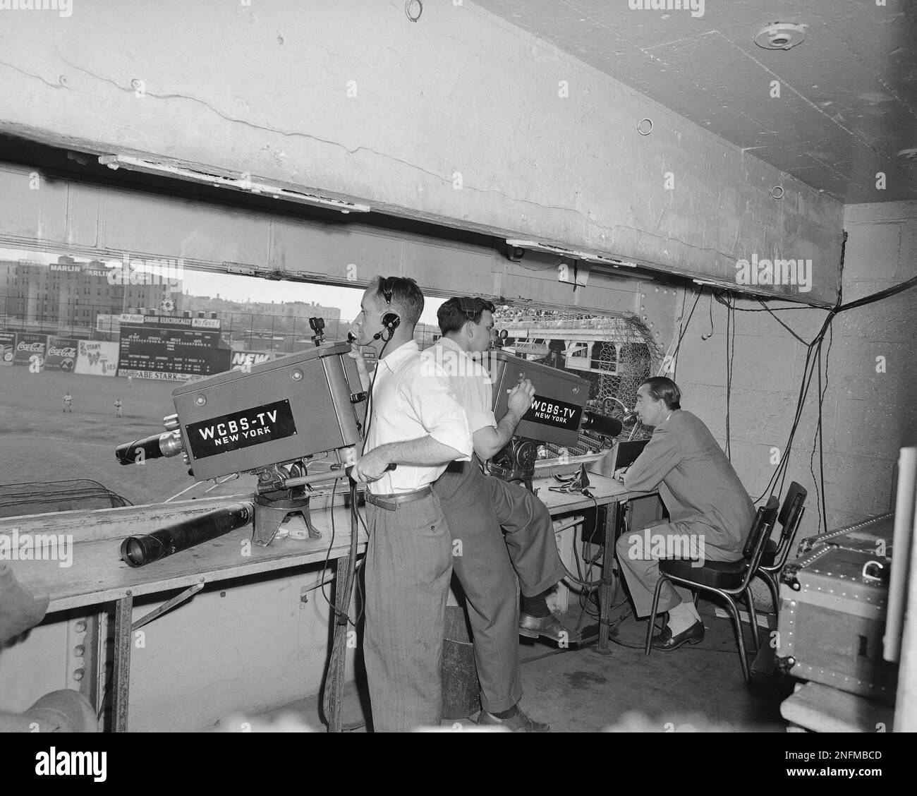Technicians operate Television Camera in the booth of the Columbia ...