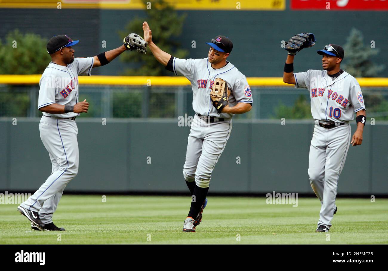 From left, New York Mets left fielder Marlon Anderson celebrates with ...