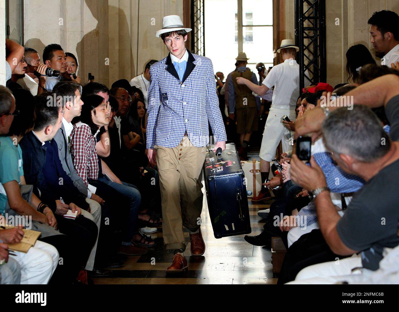 A model wears a creation for Junya Watanabe men's Fashion Spring-Summer ...