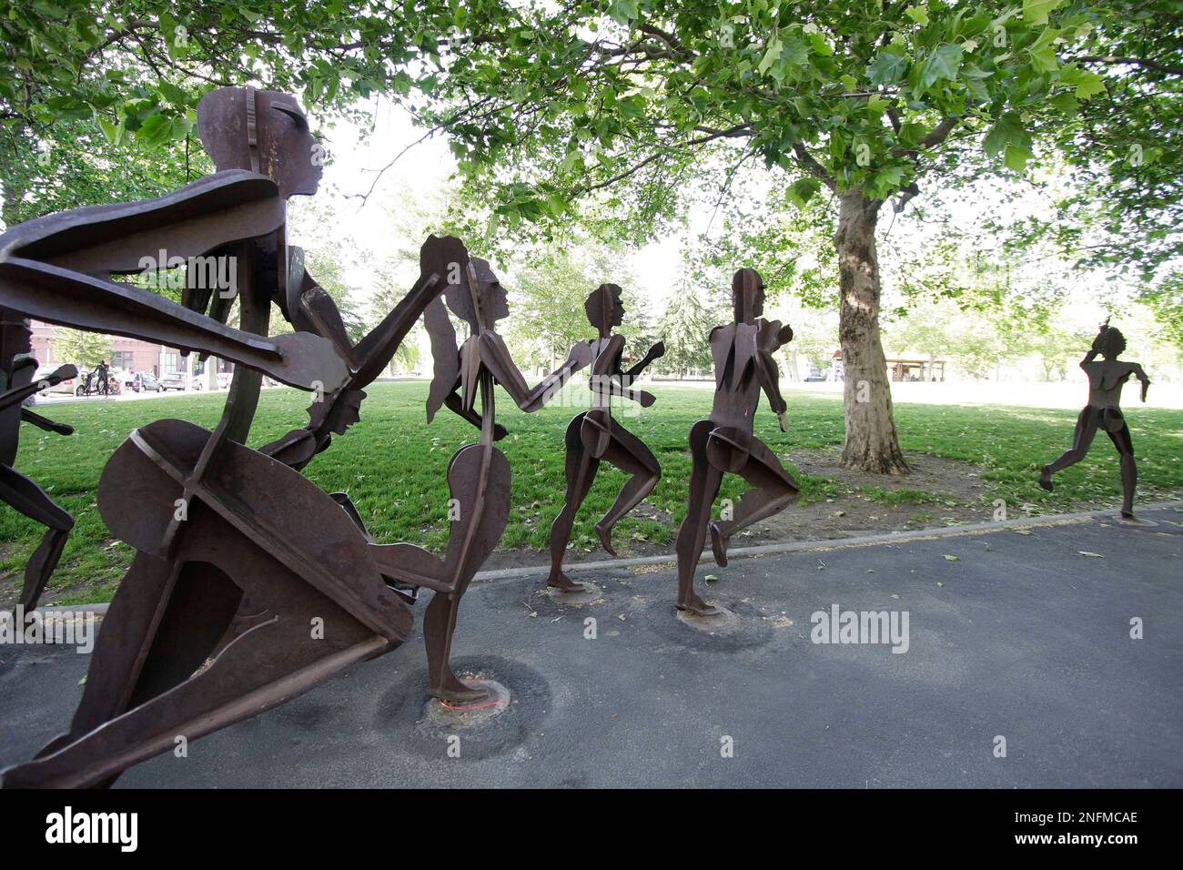 "The Joy of Running Together" by David Govedare, 1984, stands in ...