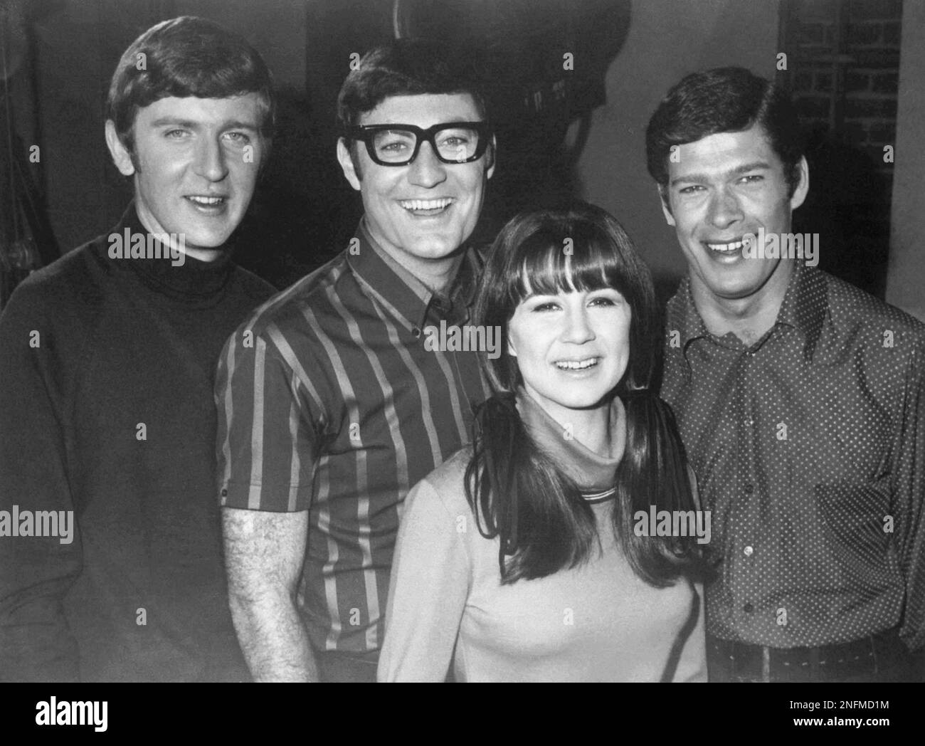 The Australian singing group 'The Seekers', pose for photographers, in ...