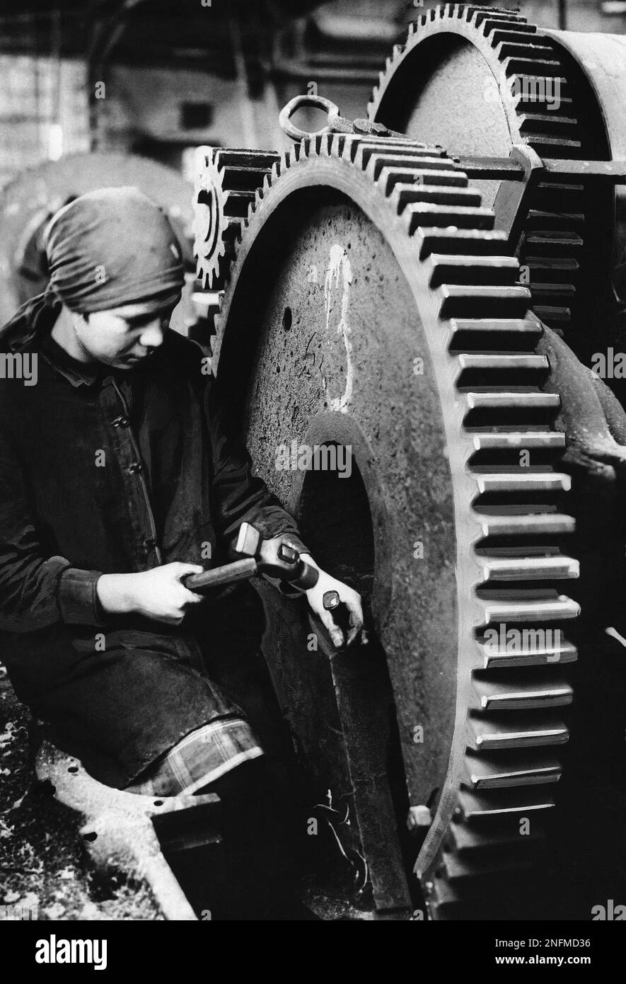 In present day proletarian Russia everybody must work, even women and ...