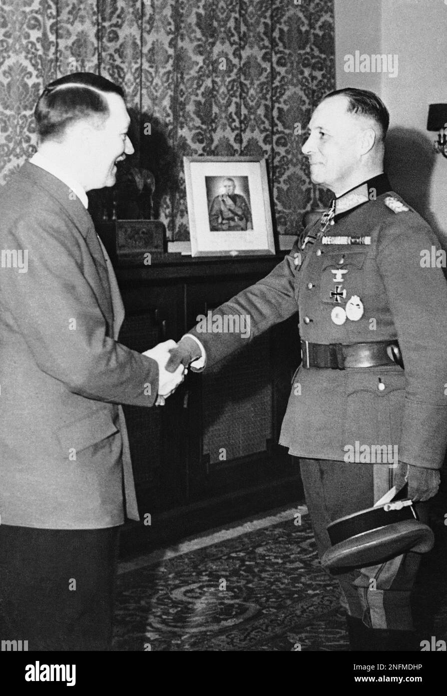 Adolf Hitler, left, congratulates Lieut. Gen. Erwin Rommel on Nov. 21 ...