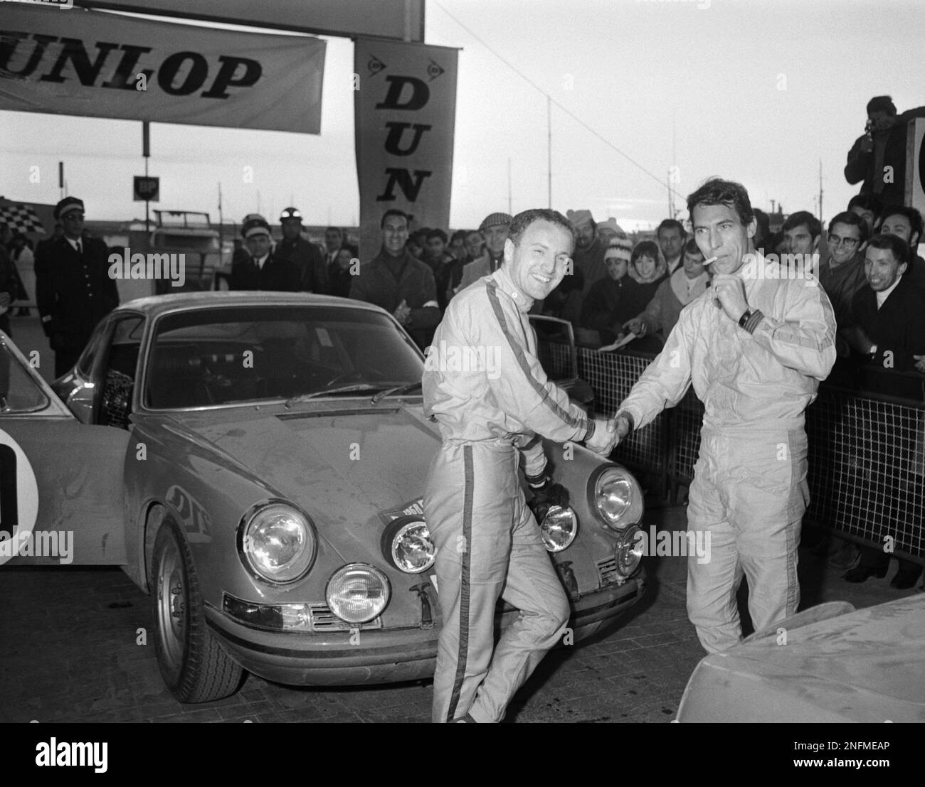British drivers David Stone, left, and Vic Elford, in Monaco, shaking ...