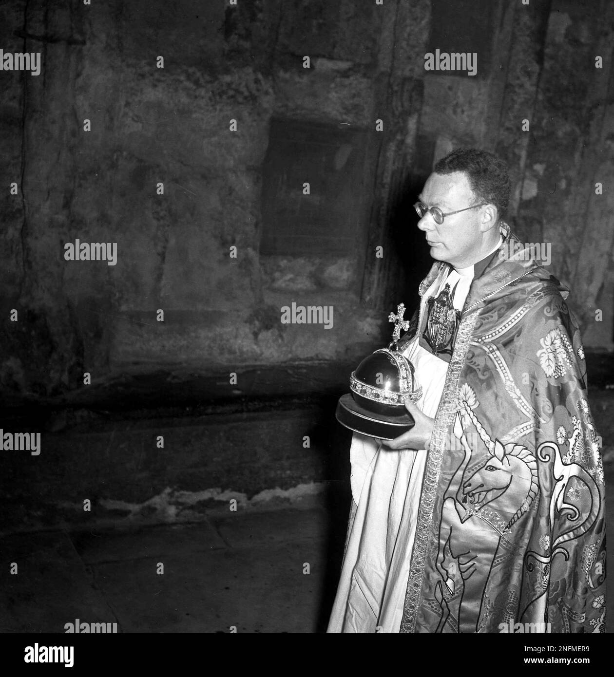 Canon Carpenter bears the Sovereign's Orb, known as a globus cruciger ...
