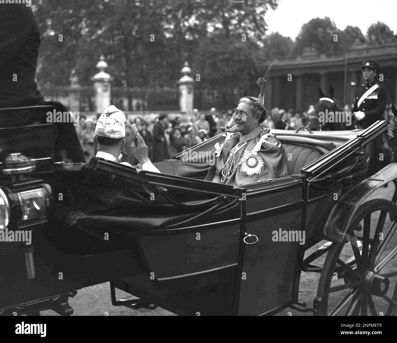 A carriage carrying Queen Salote Tupou III of Tonga forms part of the ...