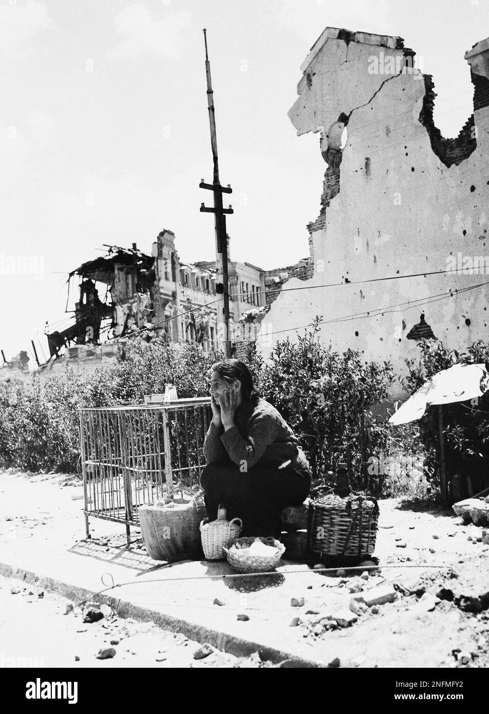 The aftermath of war is shown on a Spanish street after the end of the ...