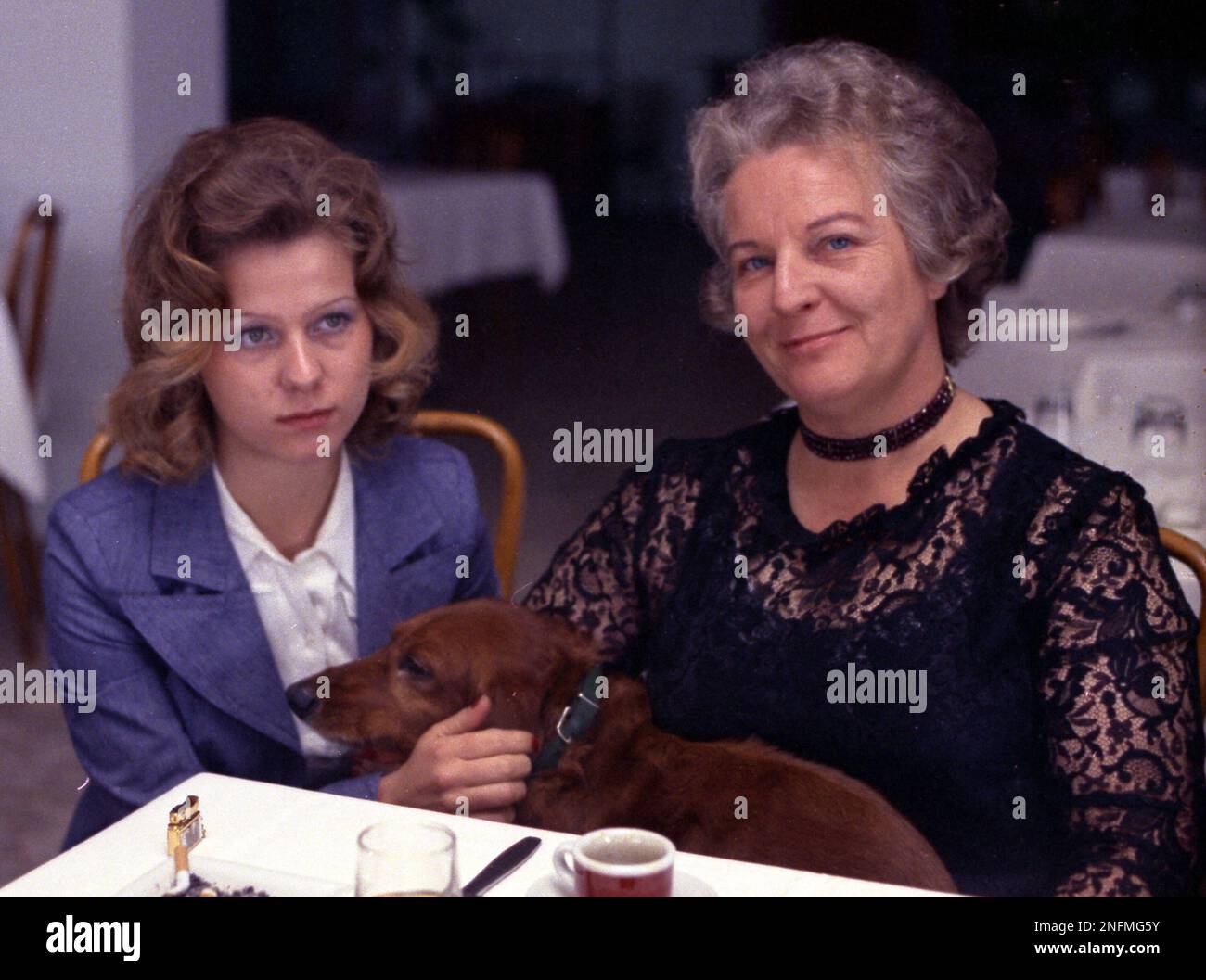 West German Anneliese Walter-Wenger, daughter Heinke and dachshund Fritz pose for the press at a ...