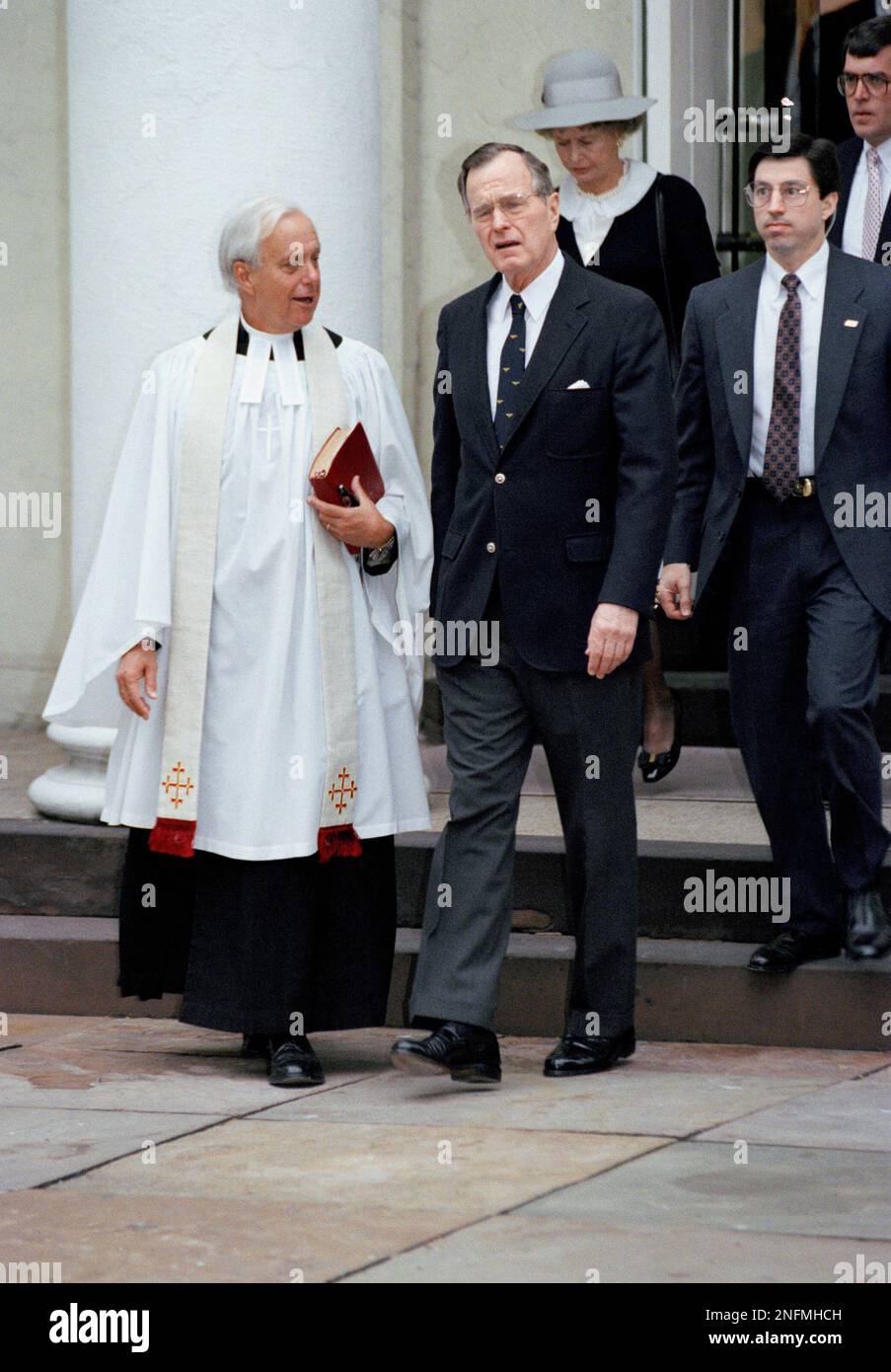 President George H.W. Bush talks with John Harper, rector of St. Johns ...