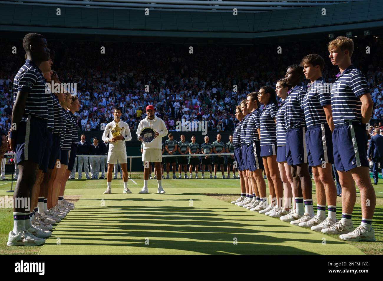 Mens Singles Champion Novak Djokovic with his winners trophy and Runner ...