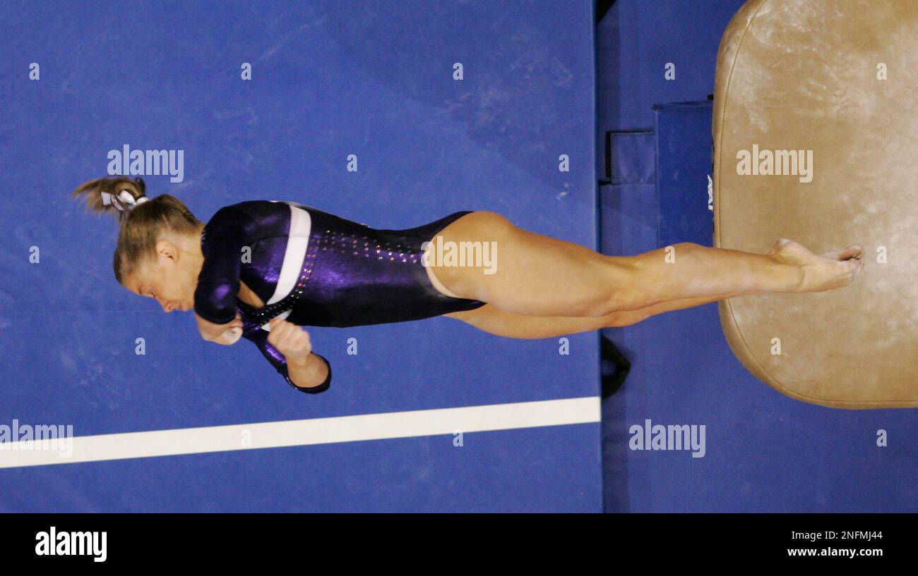 Shawn Johnson flips off the vault during the women's second day of ...
