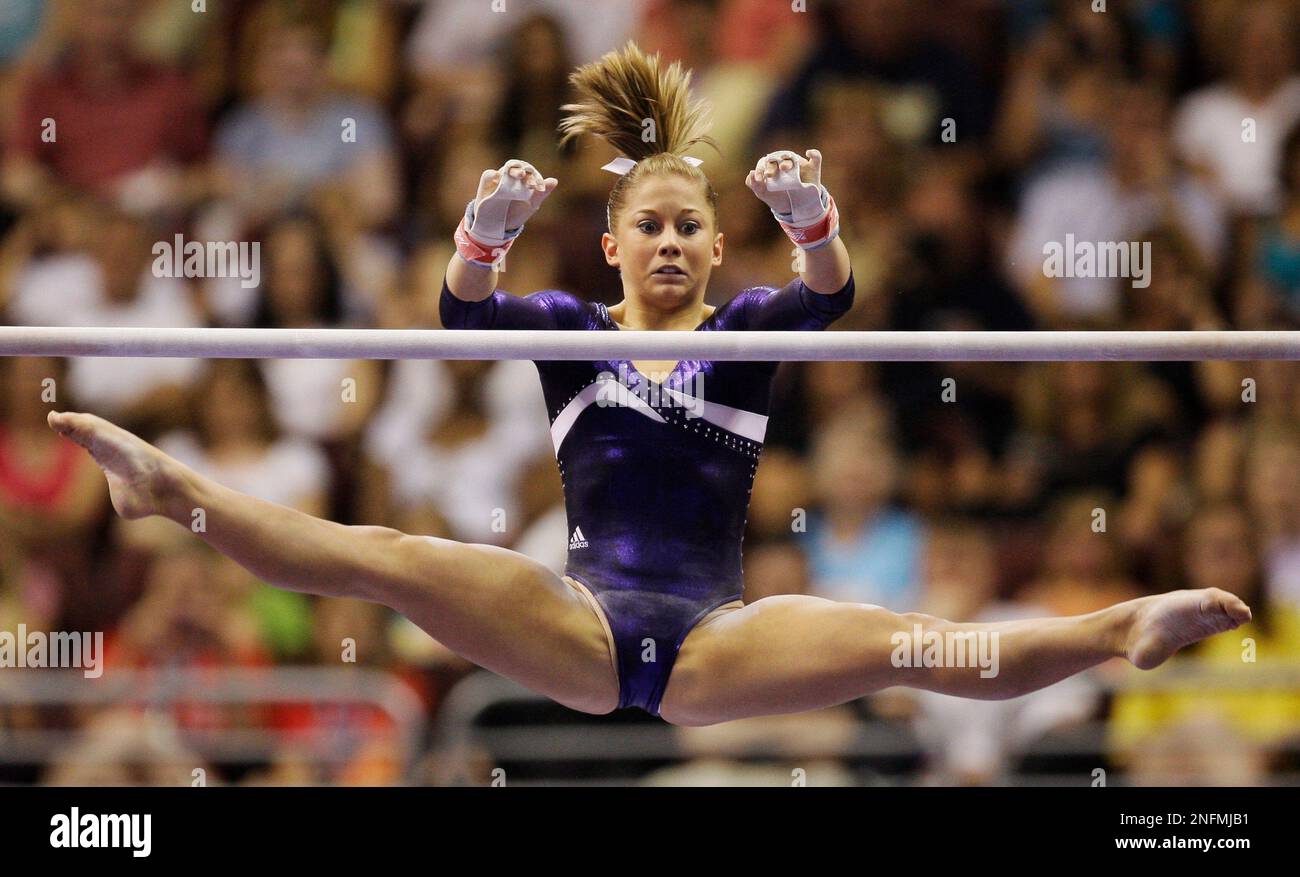 Shawn Johnson performs on the uneven bars during the women's second day ...