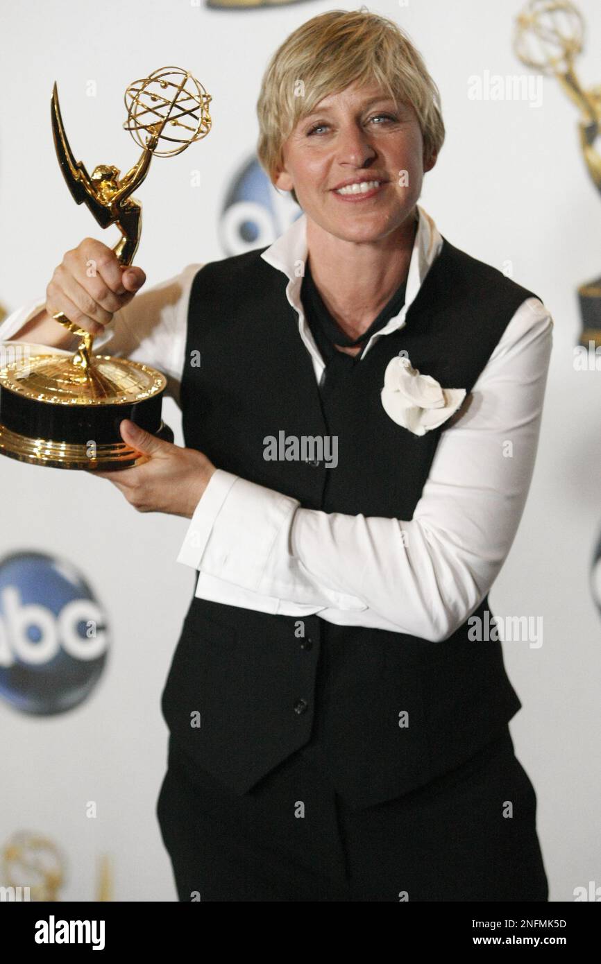 Ellen DeGeneres is photographed backstage with her award for ...