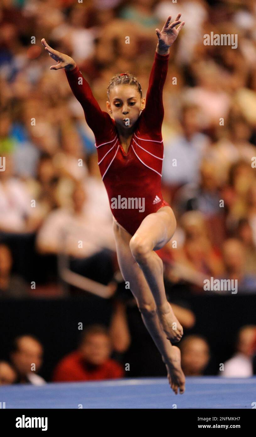 Mattie Larson performs her routine on the exercise floor during the ...