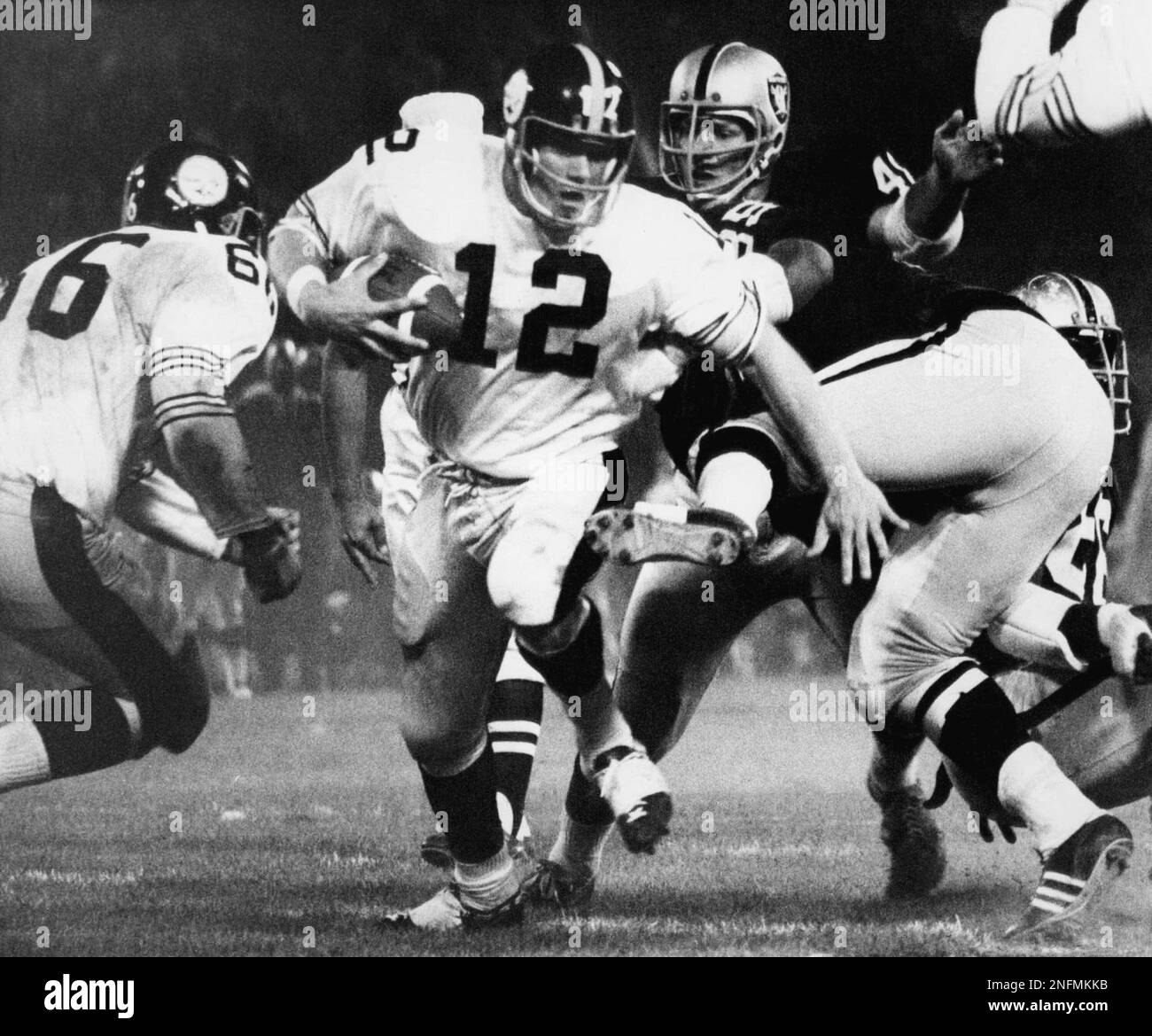 Pittsburgh Steeler rookie quarterback Terry Bradshaw picks up seven ...