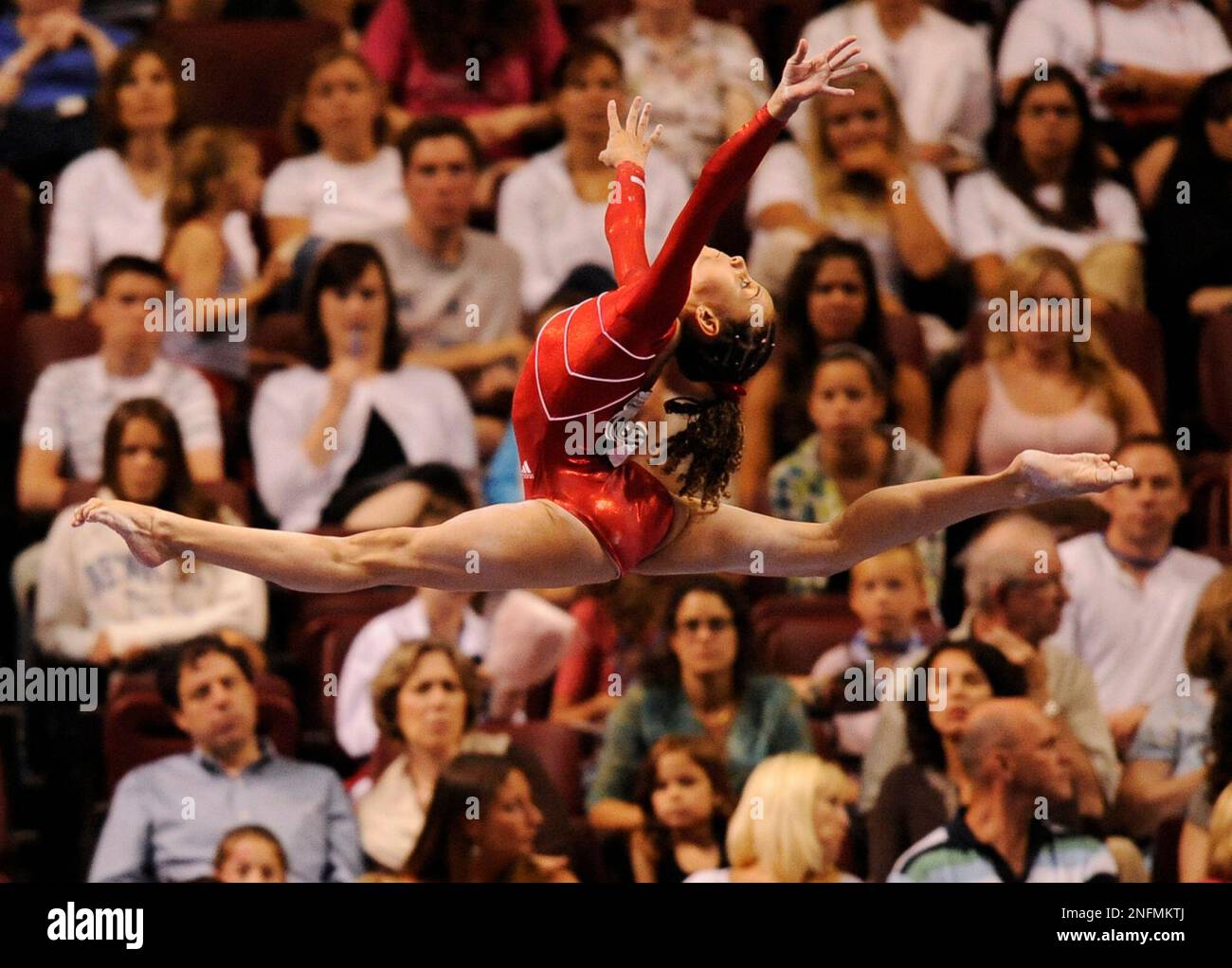 Mattie Larson goes through her routine on the balance beam during the ...