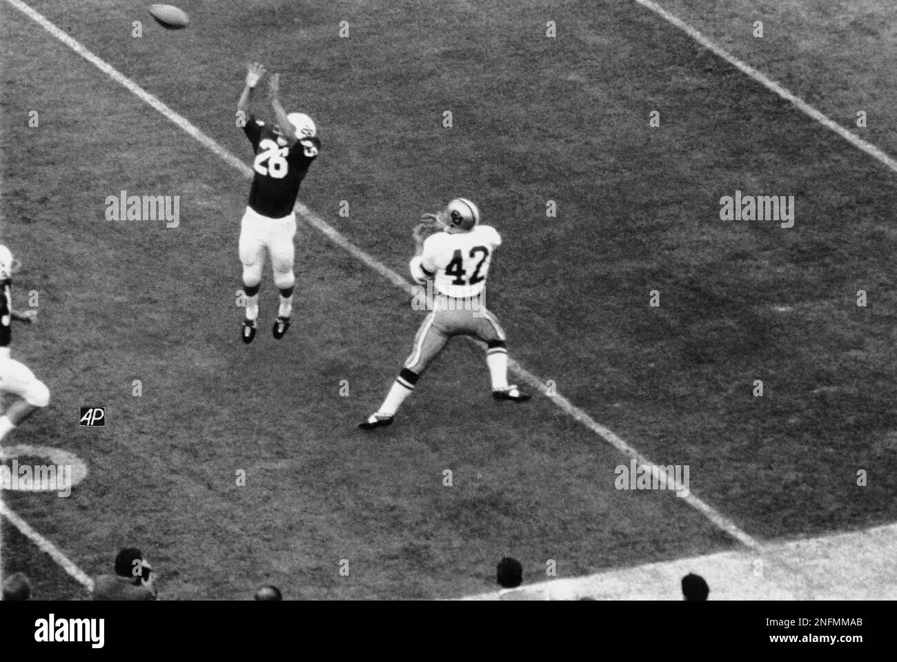 Penn State safety Neal Smith shown Nov. 25, 1969, about to tie the ...