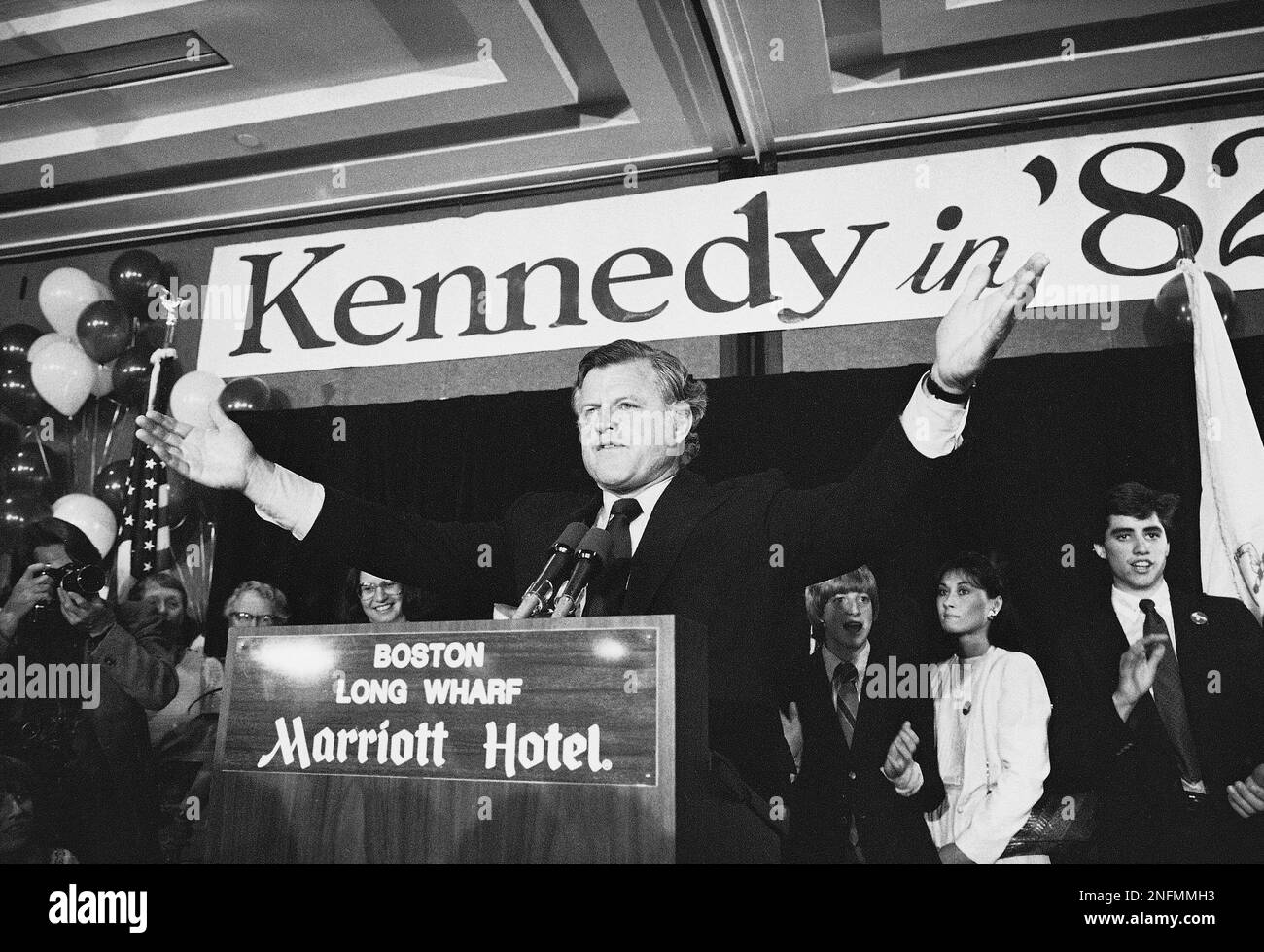 Sen. Edward M. Kennedy holds his arms up in victory as he appears ...