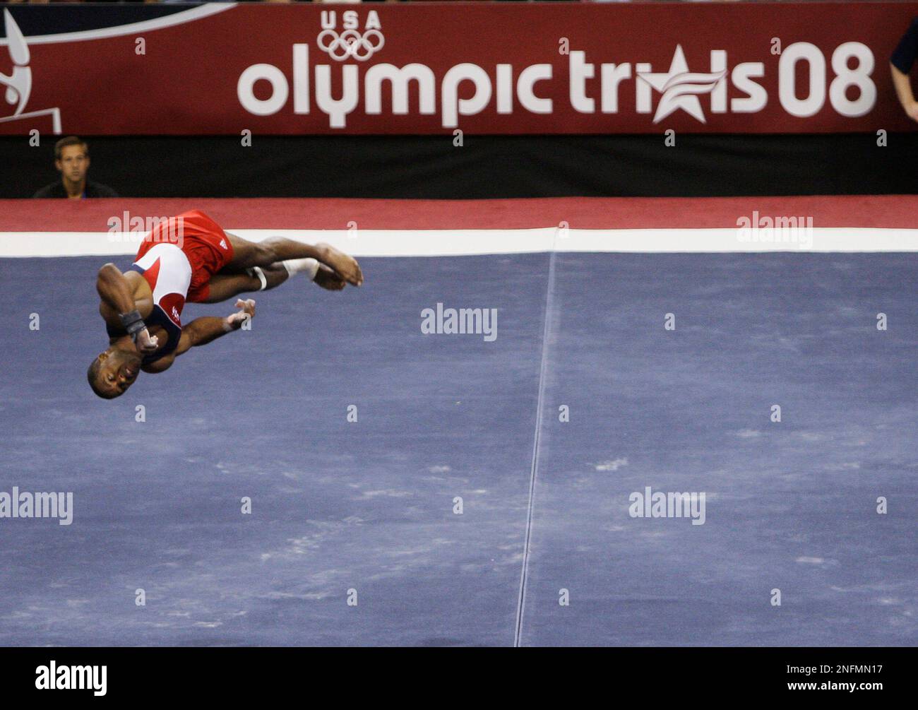 Sean Golden performs on the exercise floor during the men's first day ...