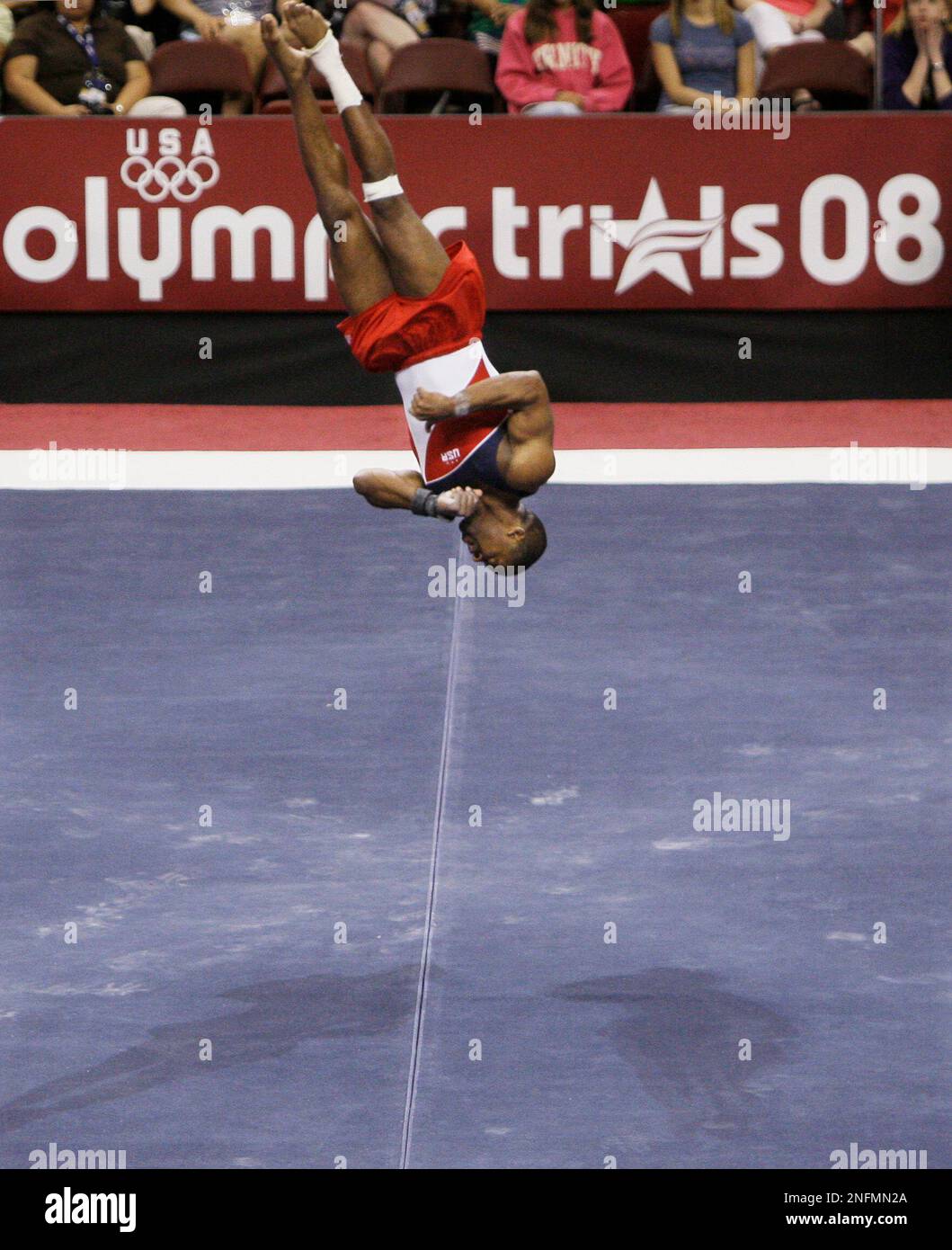 Sean Golden performs on the exercise floor during the men's first day ...