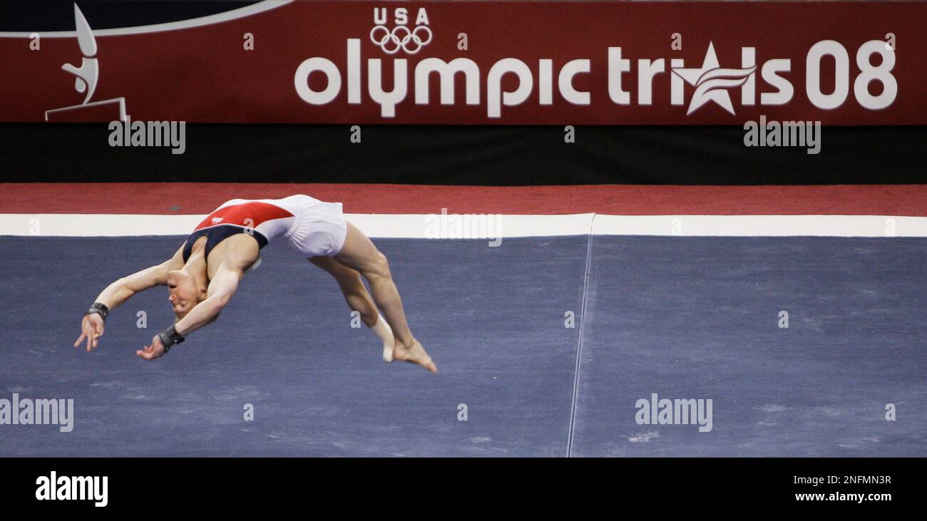 Justin Spring performs his routing on the exercise floor during the men ...