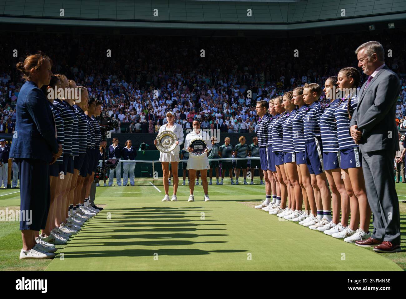 Elena Rybakina and Ons Jabeur with their trophies after the Ladies ...