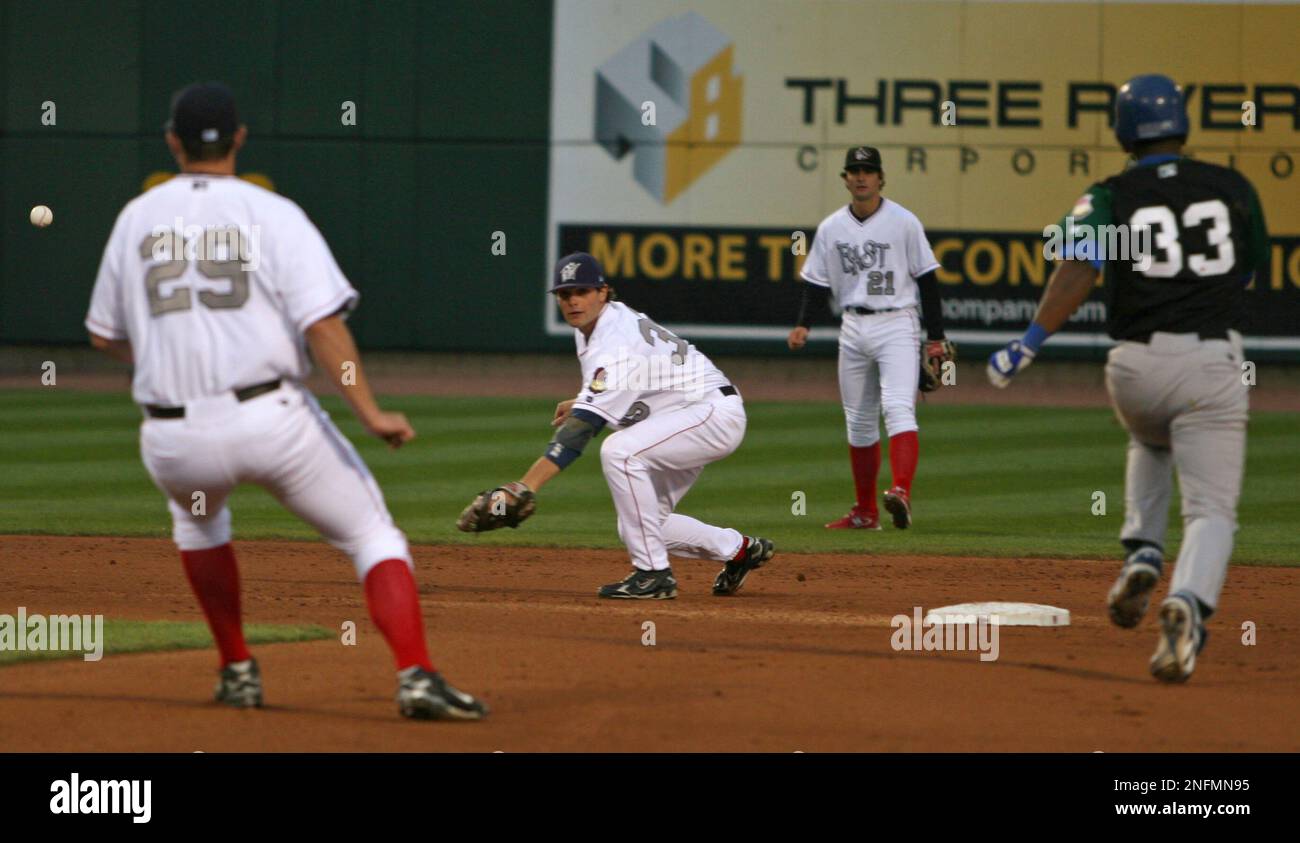 Eastern Division and Fort Wayne Wizard's Andy Parrino, center, tries to ...