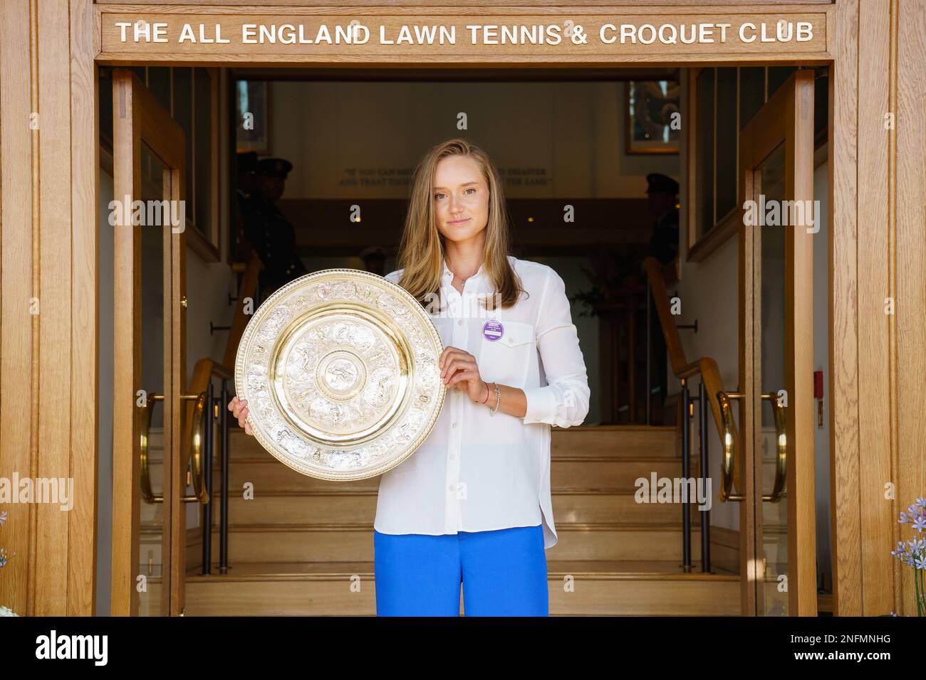 Elena Rybakina poses with her Champions trophy, the Venus Rosewater ...