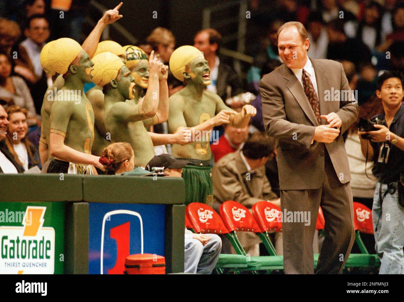 Seattle Supersonics head coach George Karl reacts to a group of ...