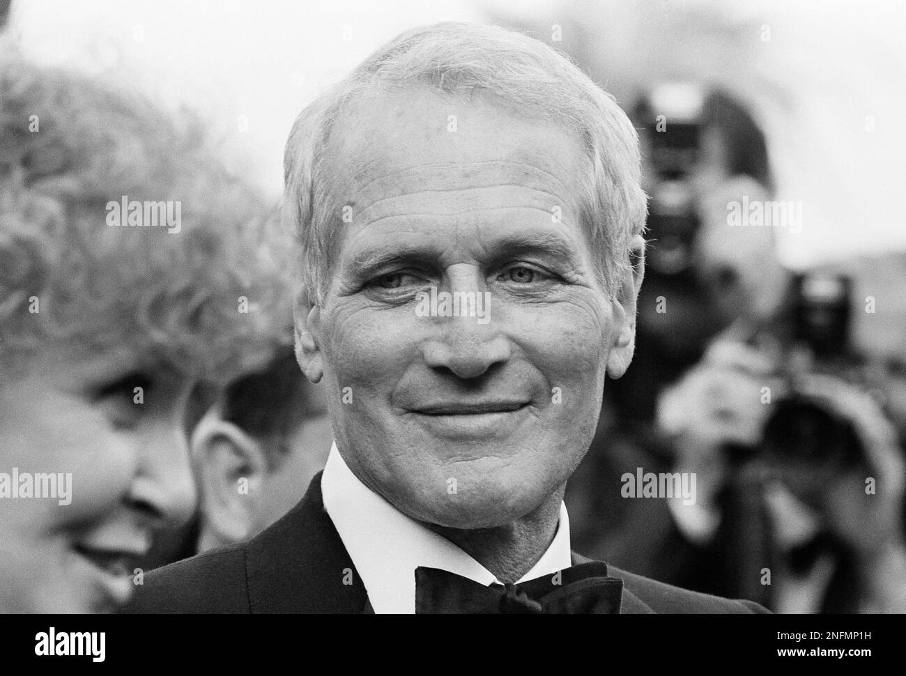 Actors Paul Newman and his wife Joanne Woodward, left, are shown at the ...