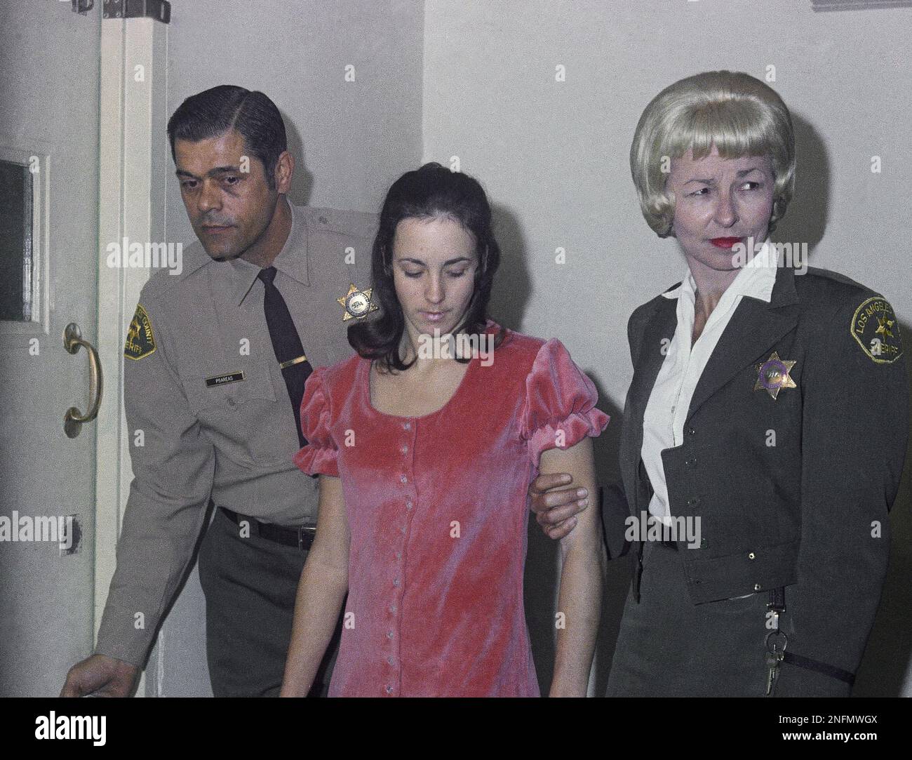Susan Atkins, center, a key witness in the Sharon Tate murder trial is ...