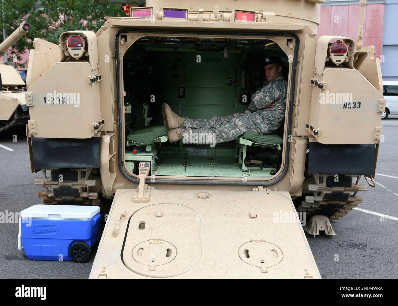 A US soldier awaits inside an ABRAMS M2A2 ODS infantry fighting vehicle ...