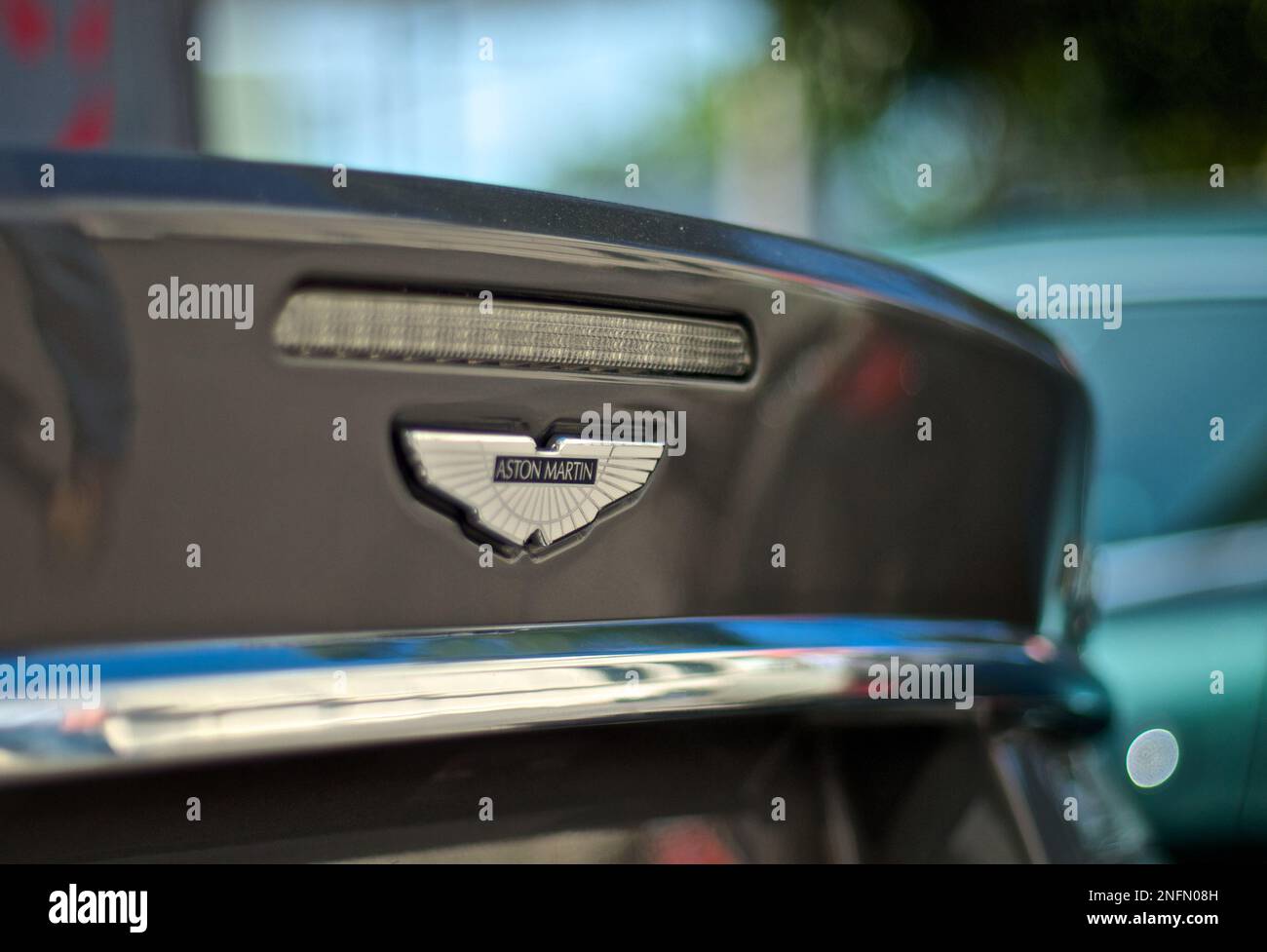 Smoke Grey Aston Martin Trunk Logo in Bokeh Depth of Field Background ...